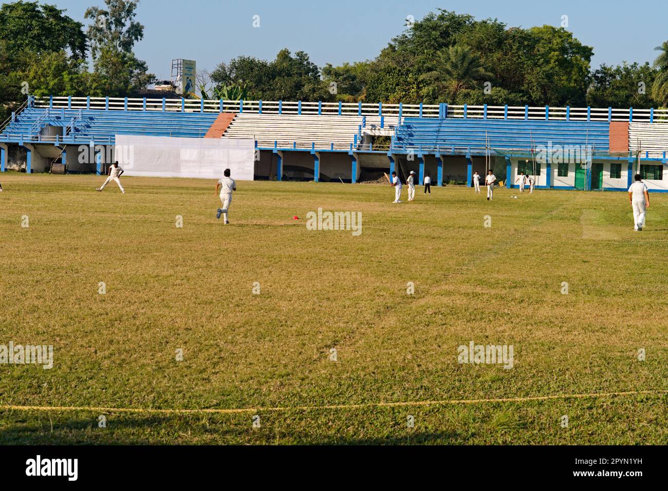 small kids playing cricket in stadium playground in india Stock Photo ...