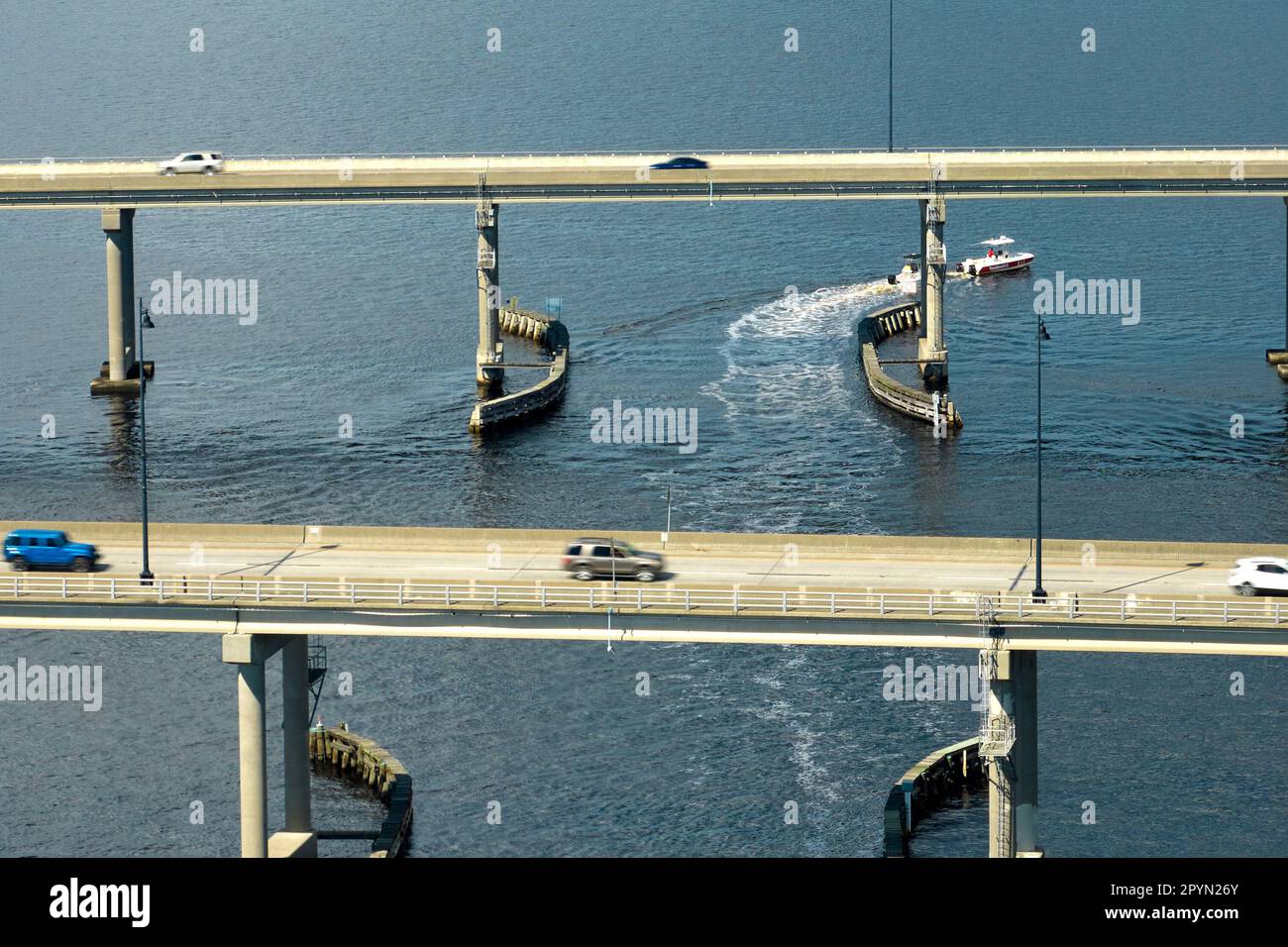 Barron Collier Bridge and Gilchrist Bridge in Florida with moving ...