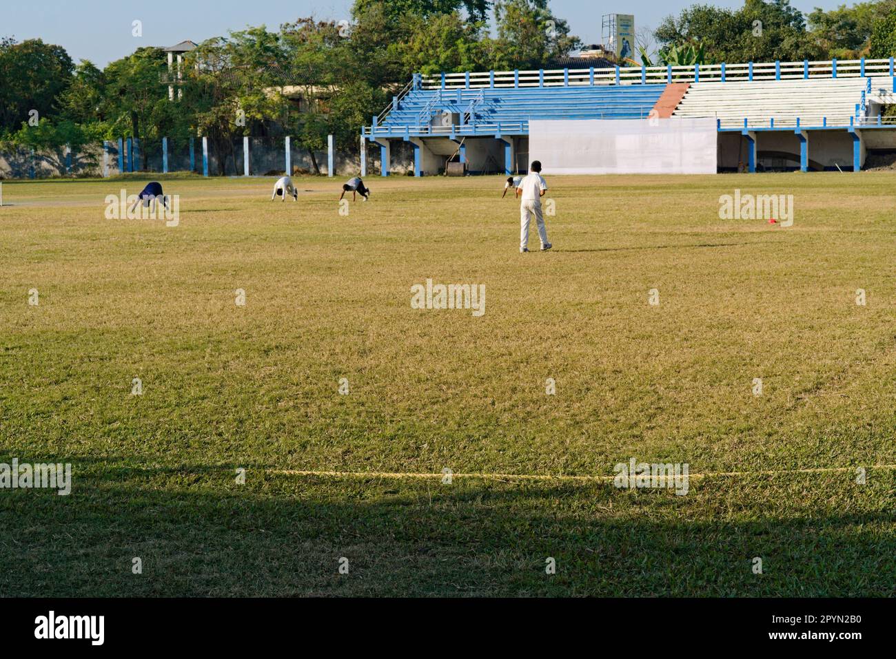 small kids playing cricket in stadium playground in india Stock Photo ...