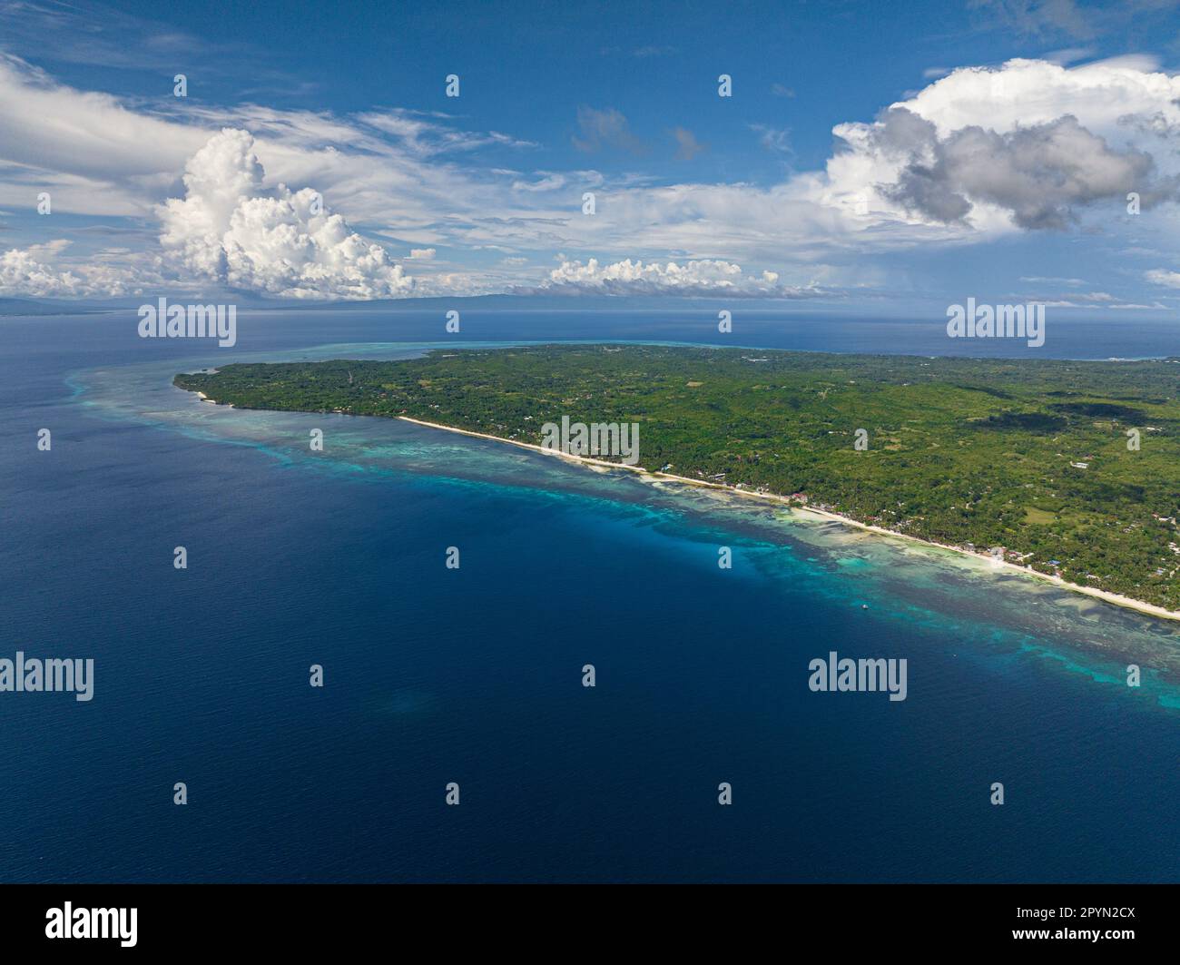 Seascape: Beautiful beach and tropical island and blue sky and clouds ...