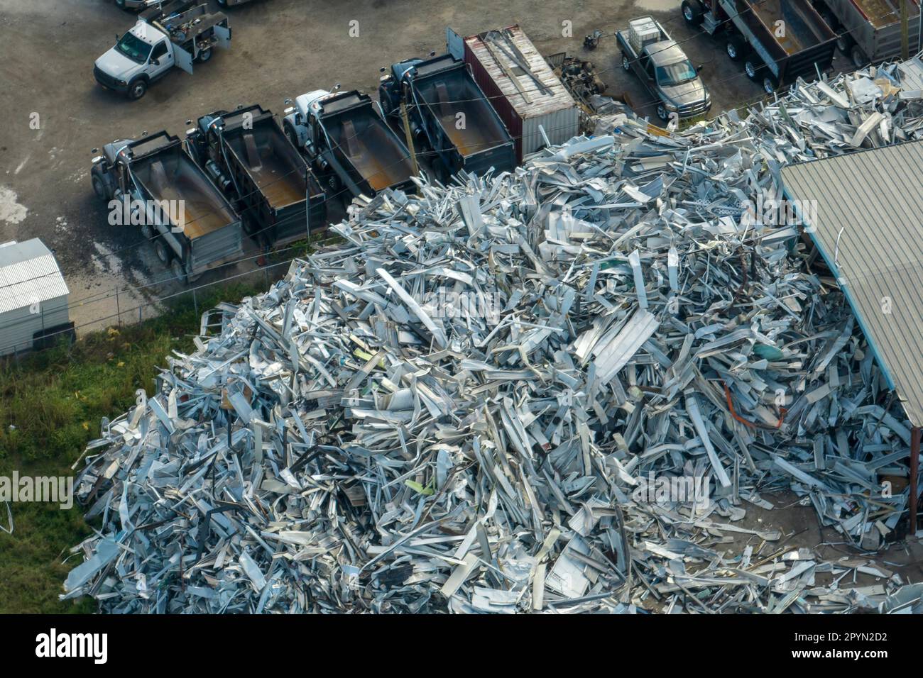Beg pile of scrap aluminum metal siding from ruined houses after ...