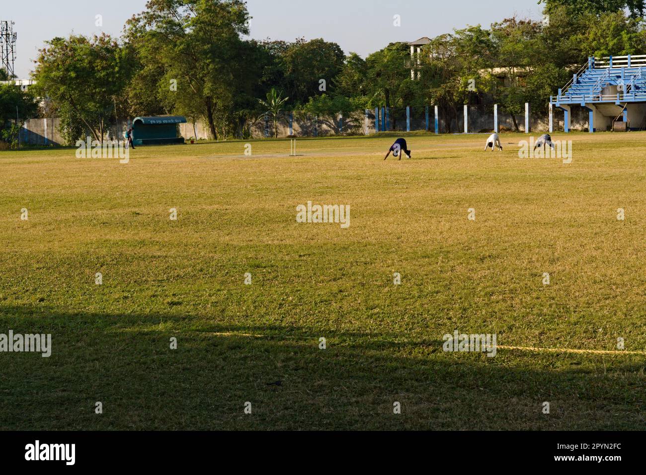 small kids playing cricket in stadium playground in india Stock Photo - Alamy