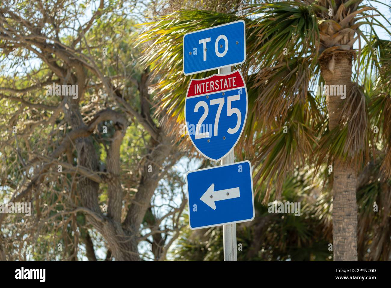 Blue direstional road sign indicating direction to I-275 freeway ...