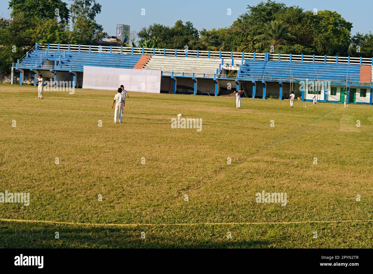 small kids playing cricket in stadium playground in india Stock Photo ...