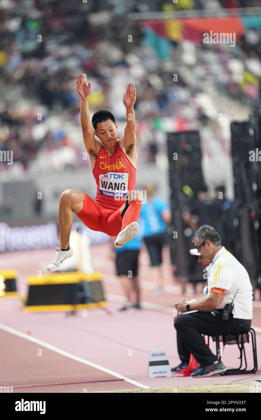 Wang Jianan in the long jump at the Doha 2019 World Athletics Championships Stock Photo - Alamy
