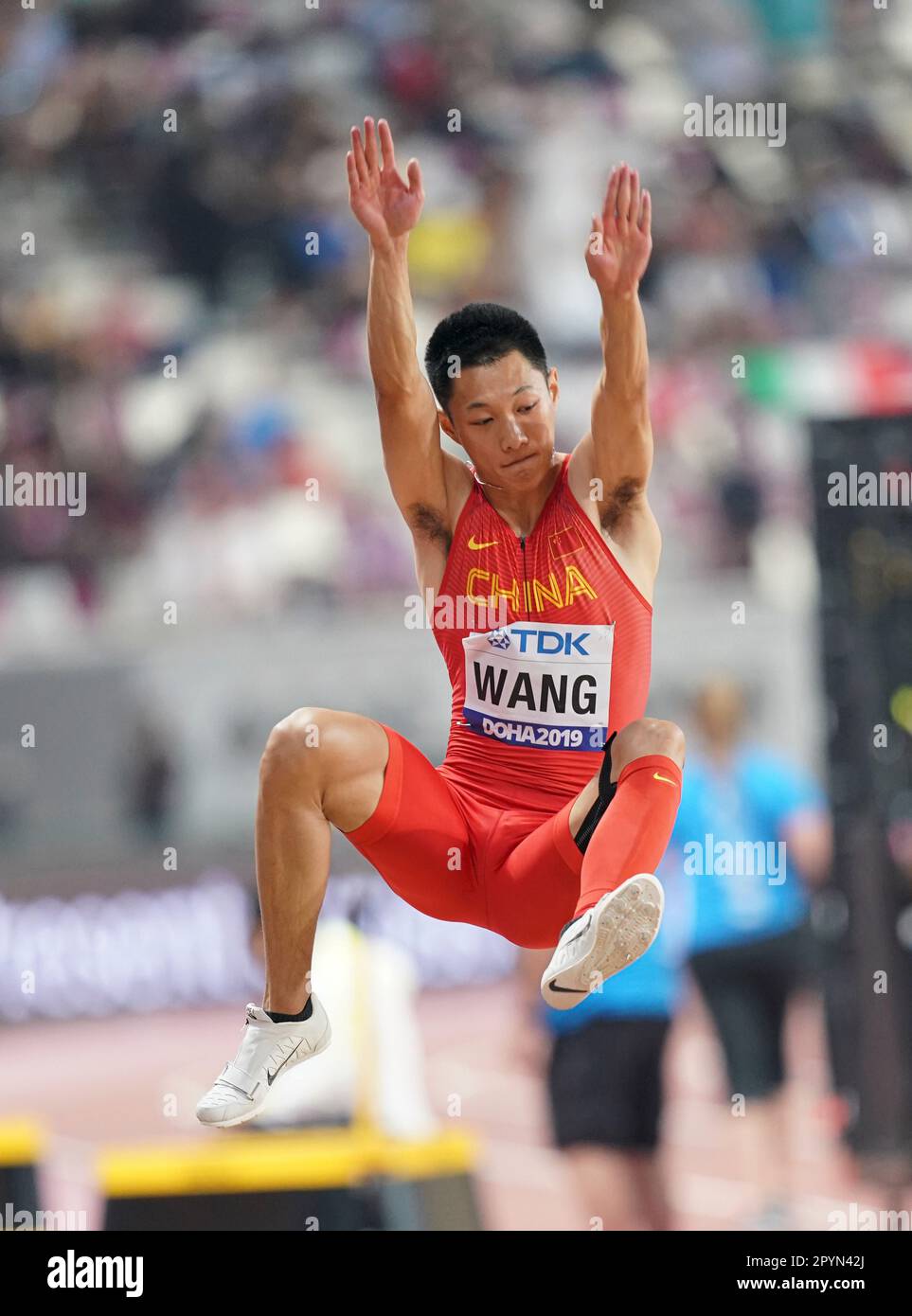 Wang Jianan in the long jump at the Doha 2019 World Athletics Championships Stock Photo - Alamy