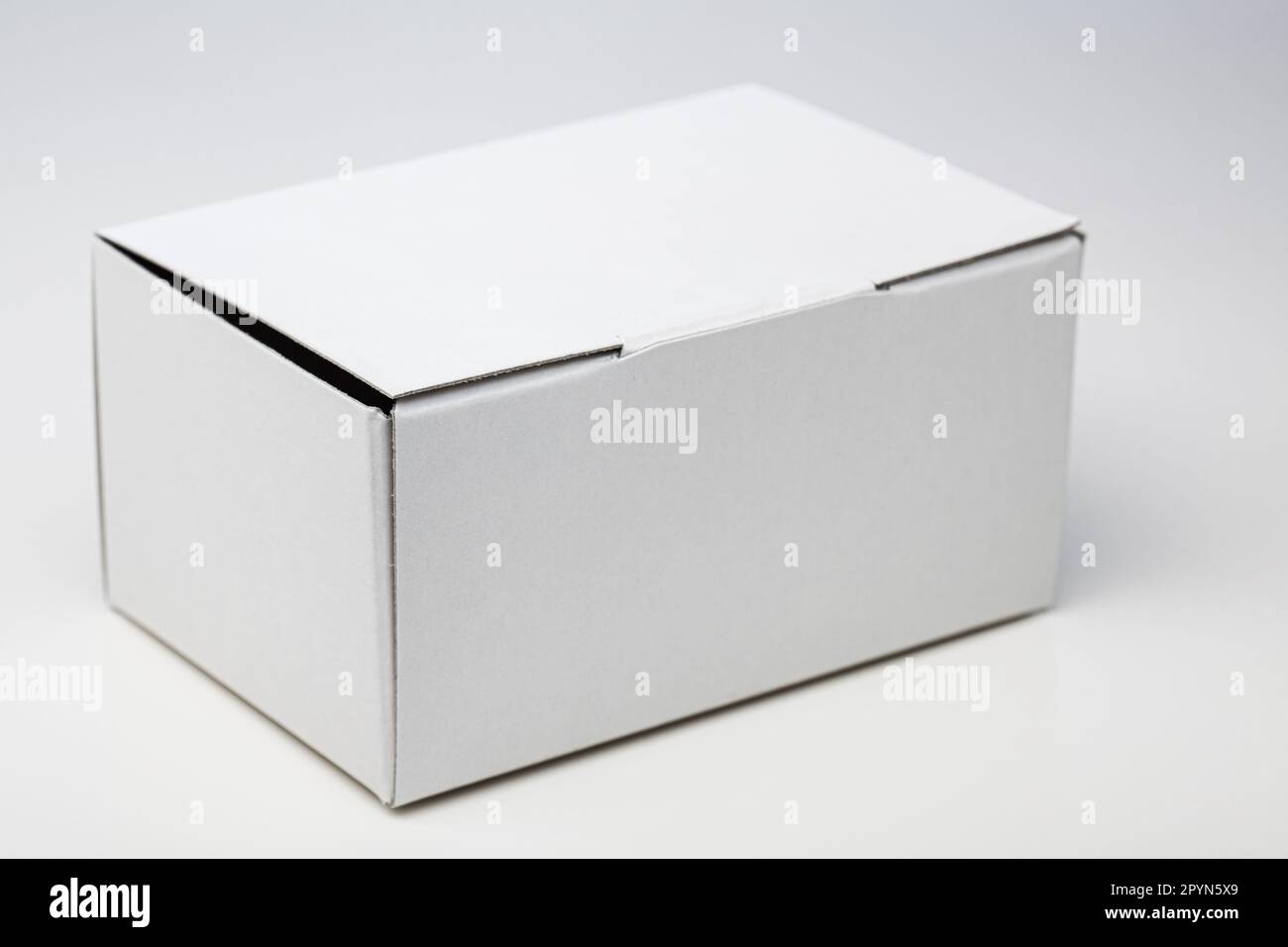White cardboard box. Small recyclable container Stock Photo - Alamy