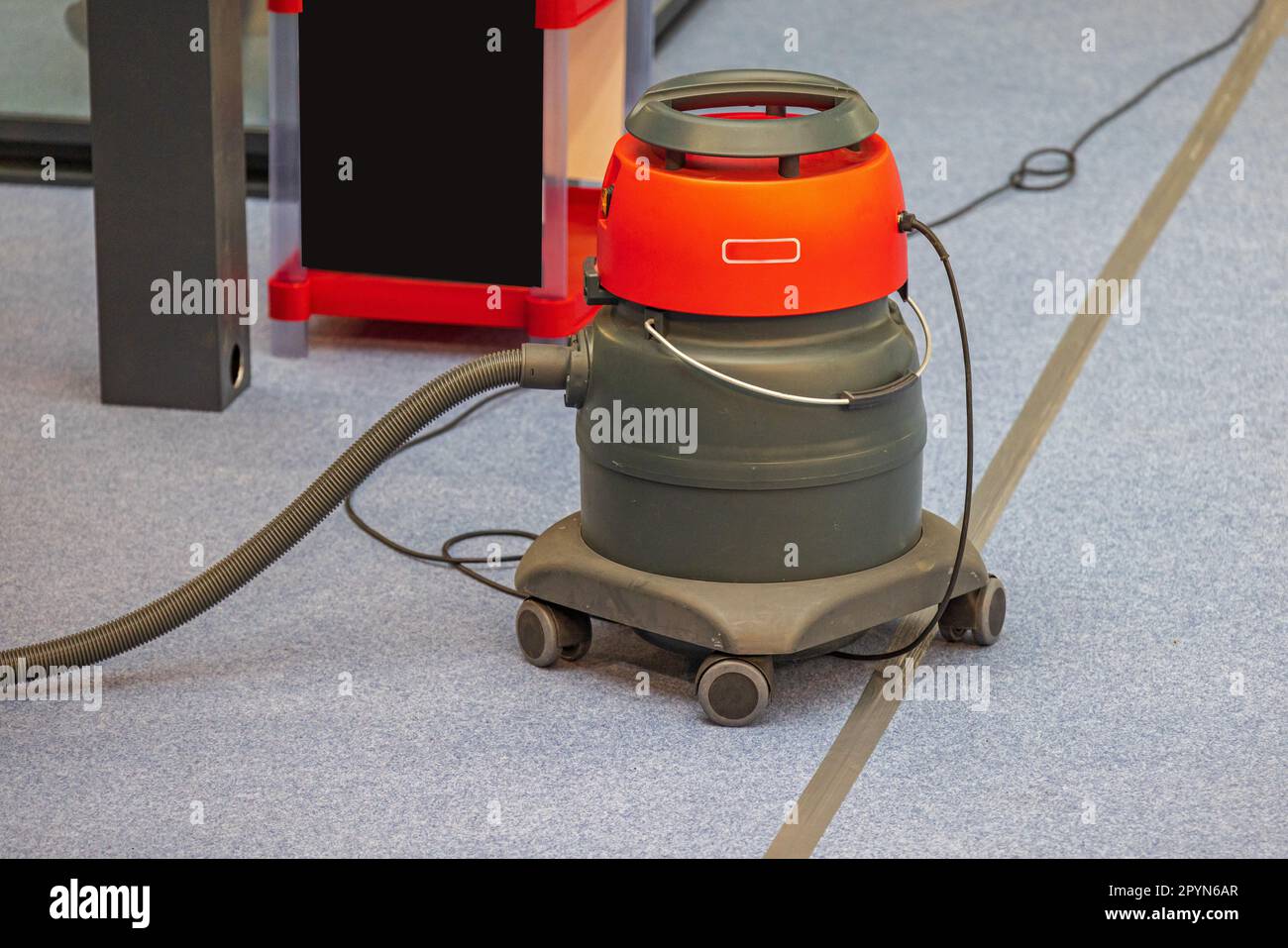Big Industrial Vacuum Cleaner at Carpet Floor Office Stock Photo - Alamy