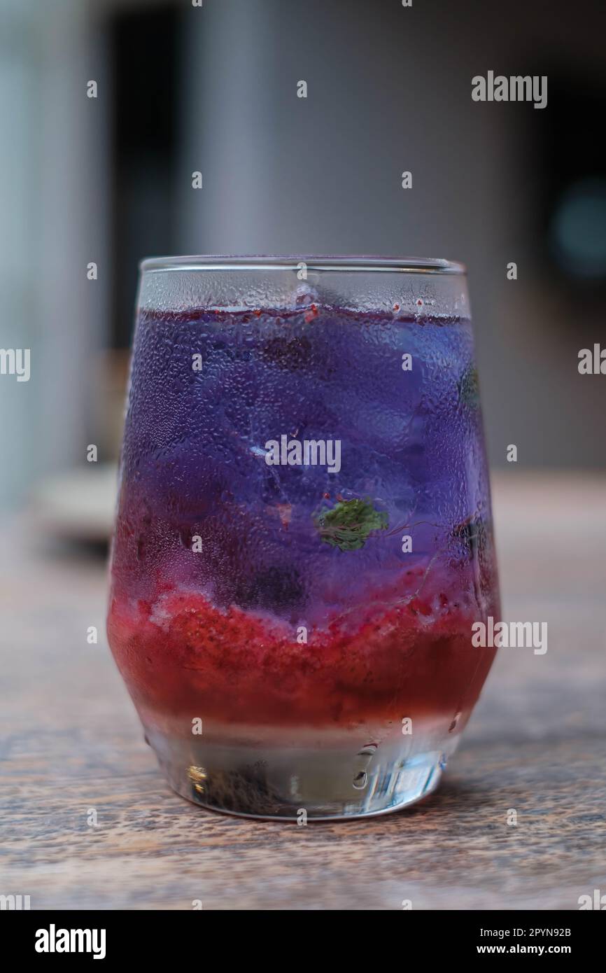 Vertical shot of a fresh drink made of Strawberry Fruit combined with ...