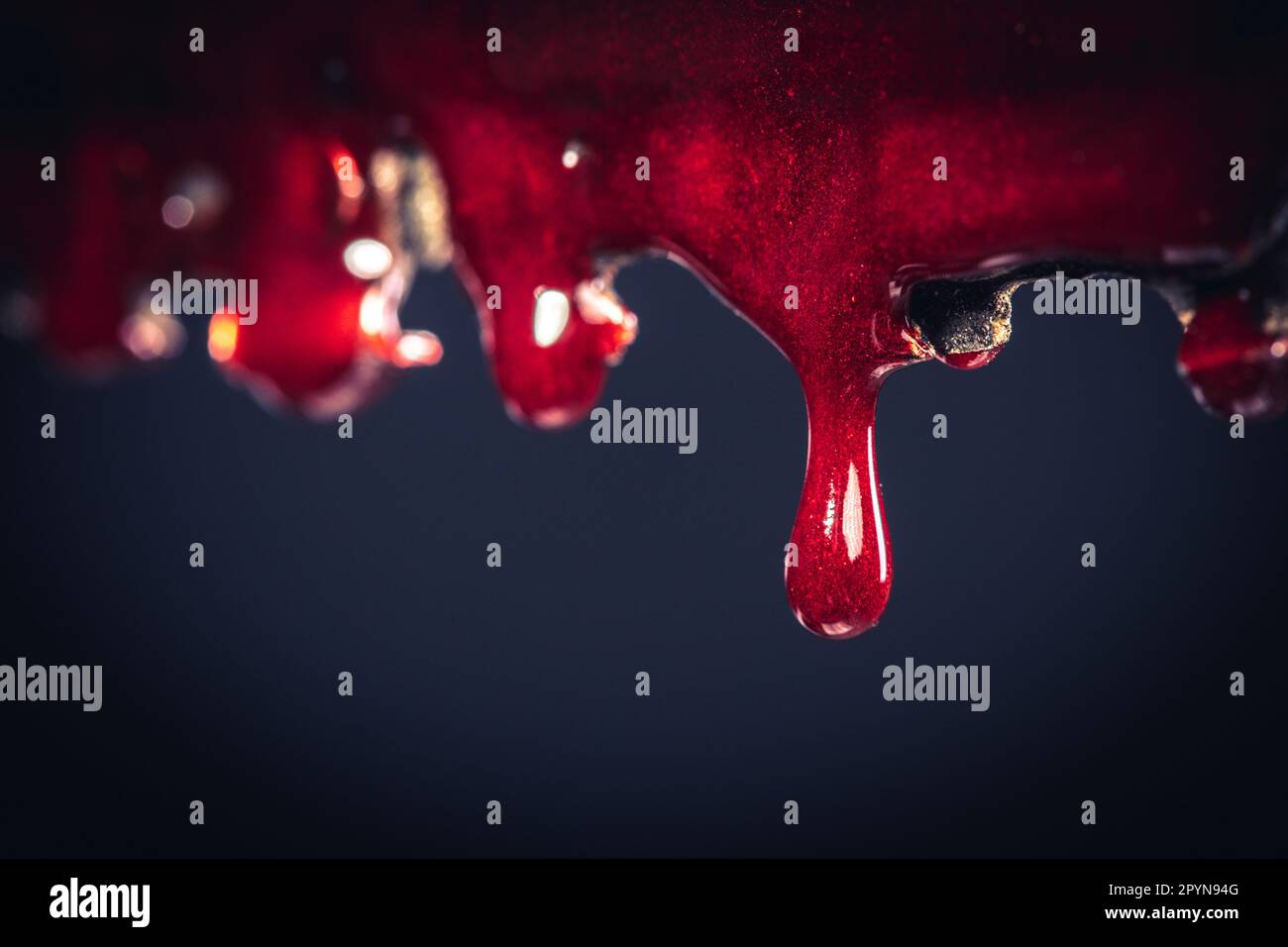 detail of drop of blood on chainsaw blade Stock Photo - Alamy