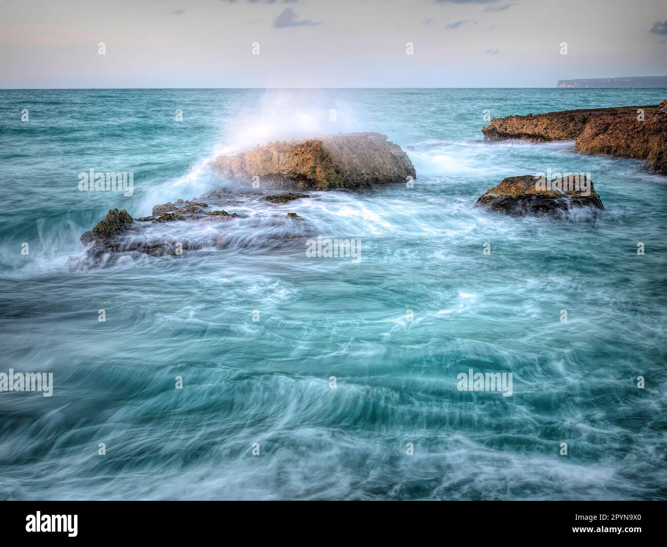 Ocean tidal current at sunrise Stock Photo - Alamy