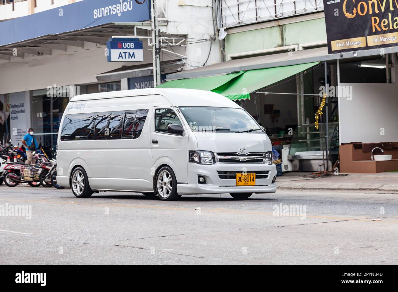 Thailand, Phuket - 03.31.23: White Toyota Commuter Hiace with big alloy wheels on the road in ...