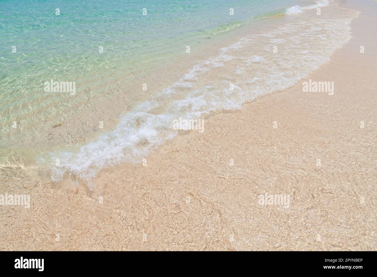Clean yellow sand on the coast of Bamboo island in Thailand with clear ...