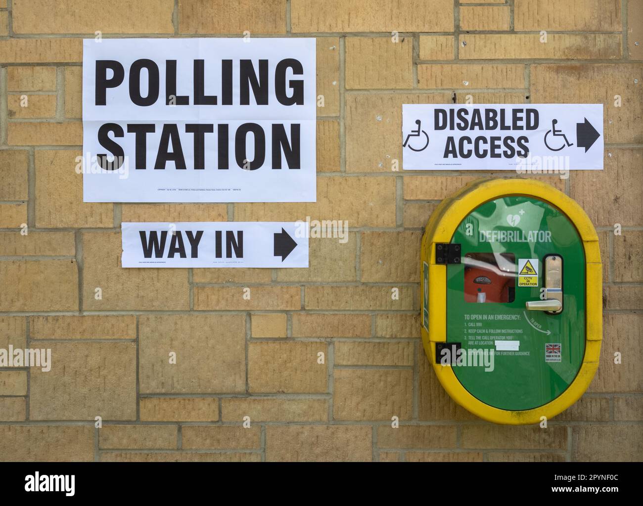 A wall adorned with a variety of signs catches including a prominent ...