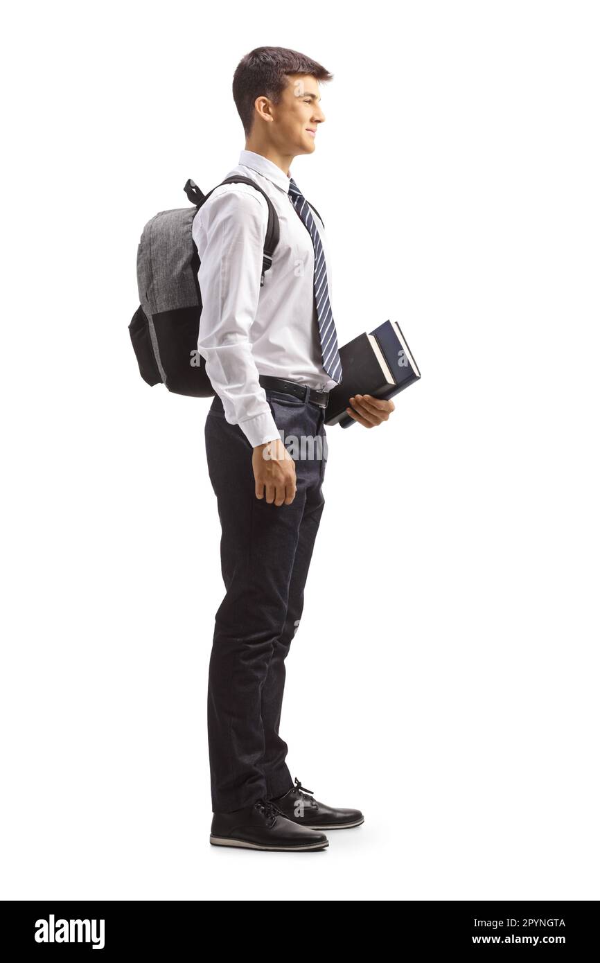 Full length profile shot of a male teen student in a school uniform ...