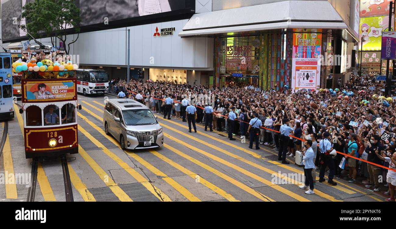 Fans of Cantopop singer Keung To, a member of local boy group Mirror ...