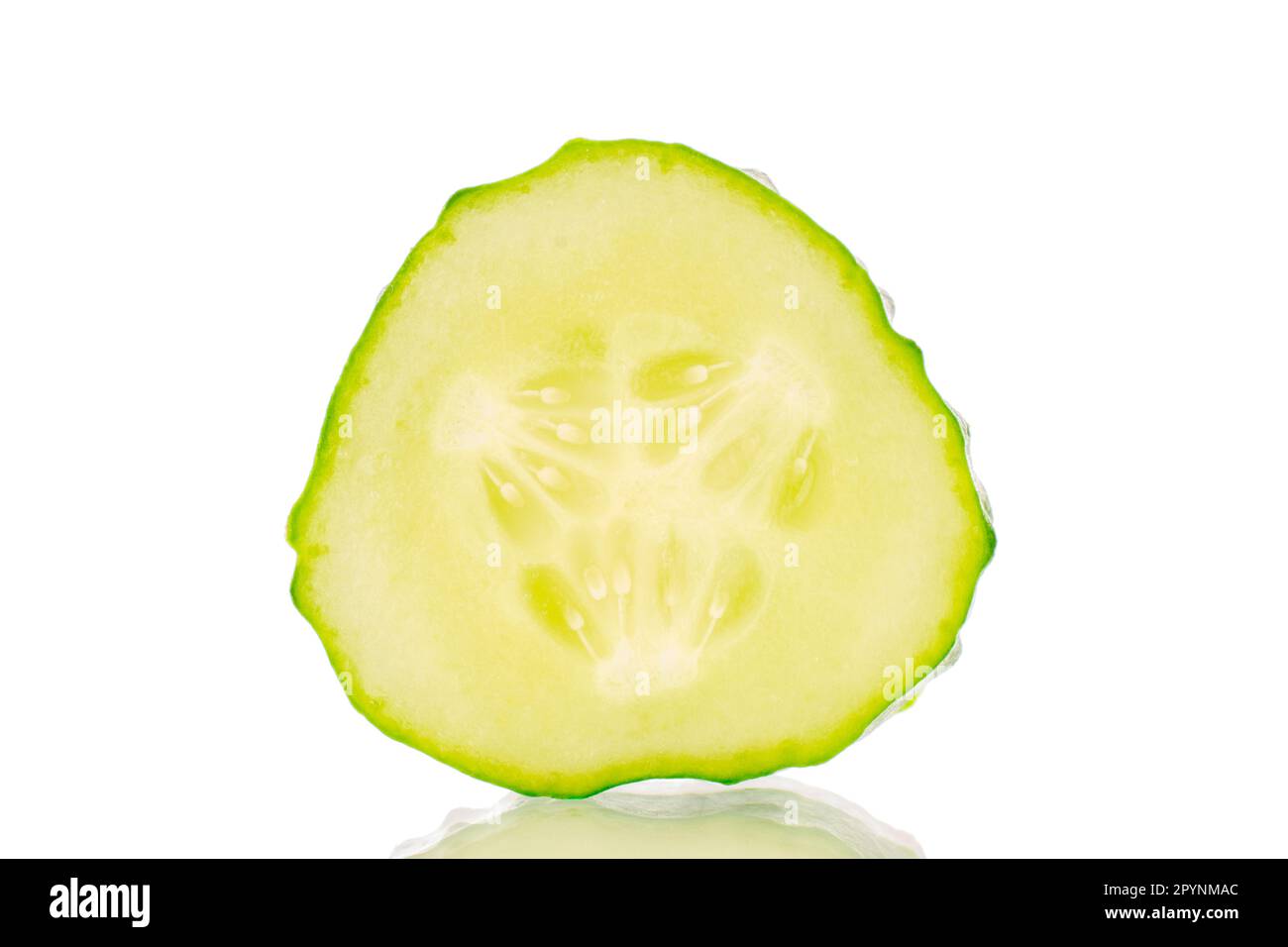 One slice of ripe gherkin cucumber, macro, isolated on white background ...