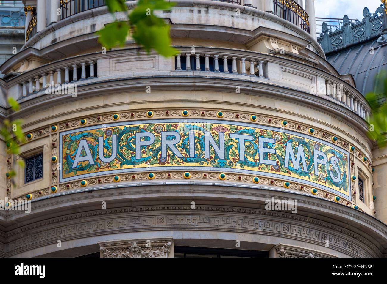 Close-up shot of the mosaic sign 'Au Printemps' on the facade of the ...