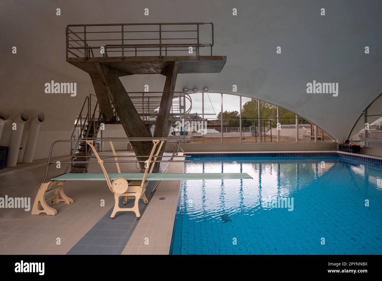 view from inside a diving pool with its diving boards Stock Photo - Alamy