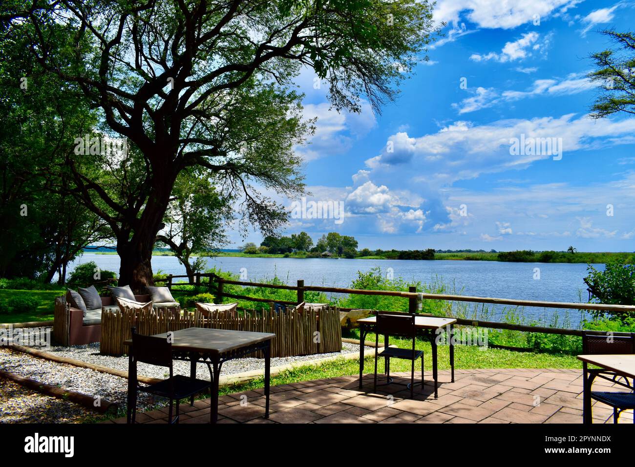 Outdoors reading nook by Chobe River at Chobe Marina Lodge Stock Photo ...