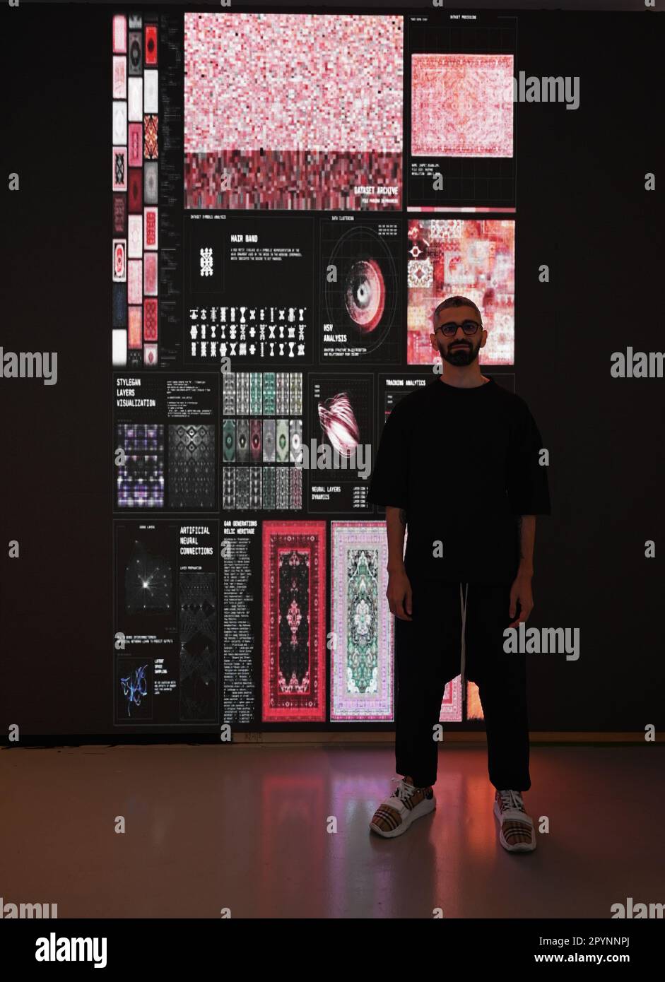 AI artist Orkhan with his digital AI carpet works at HOFA 's new AI and ...