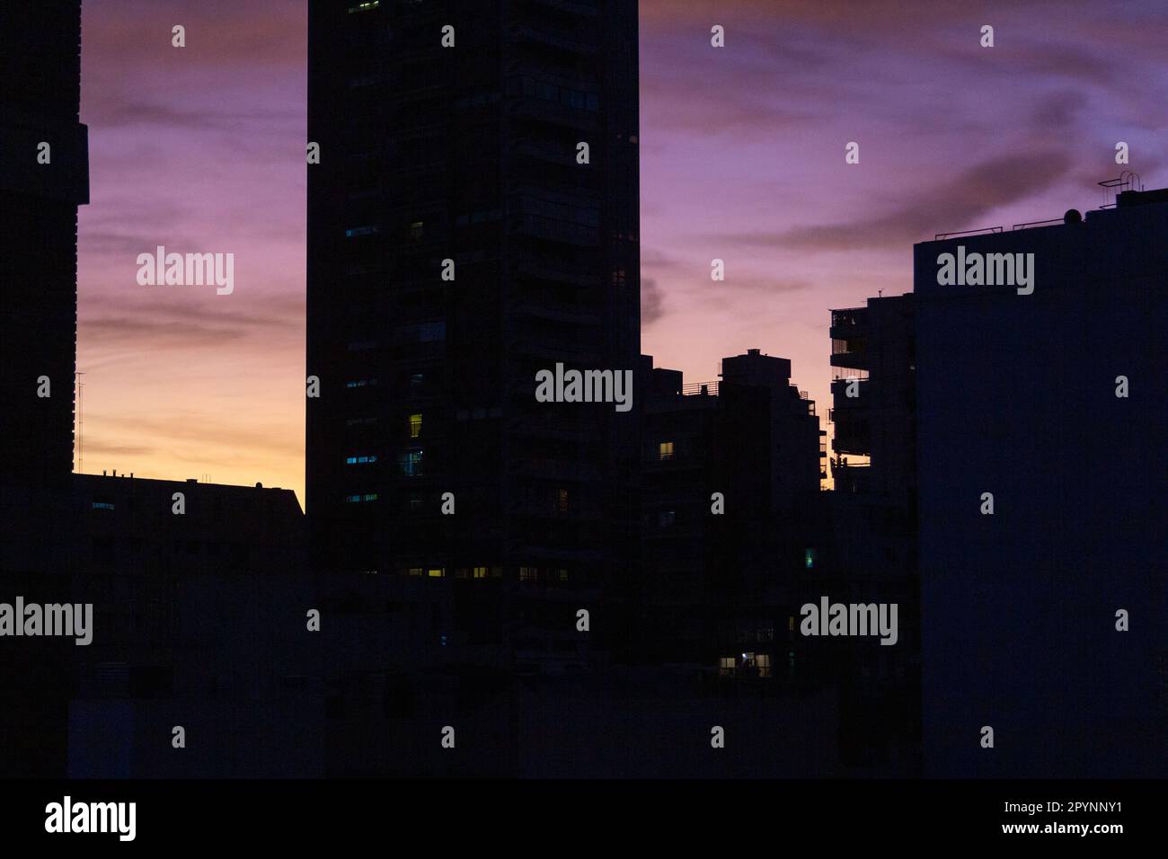 Beautiful sunset sky against the backdrop of city skyscrapers Stock ...