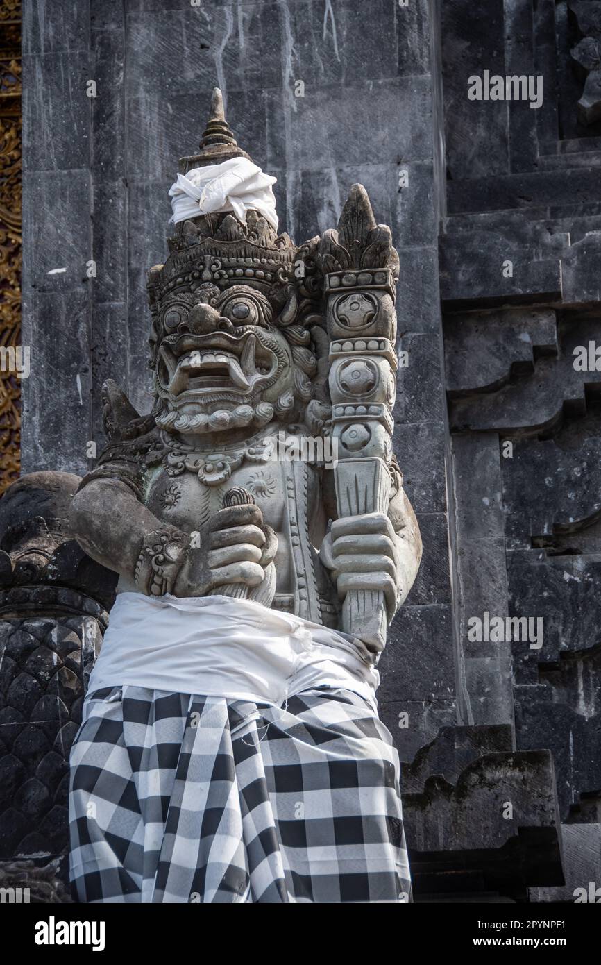 Classical Balinese stone sculpture on the grounds of the "Goa Lawa ...