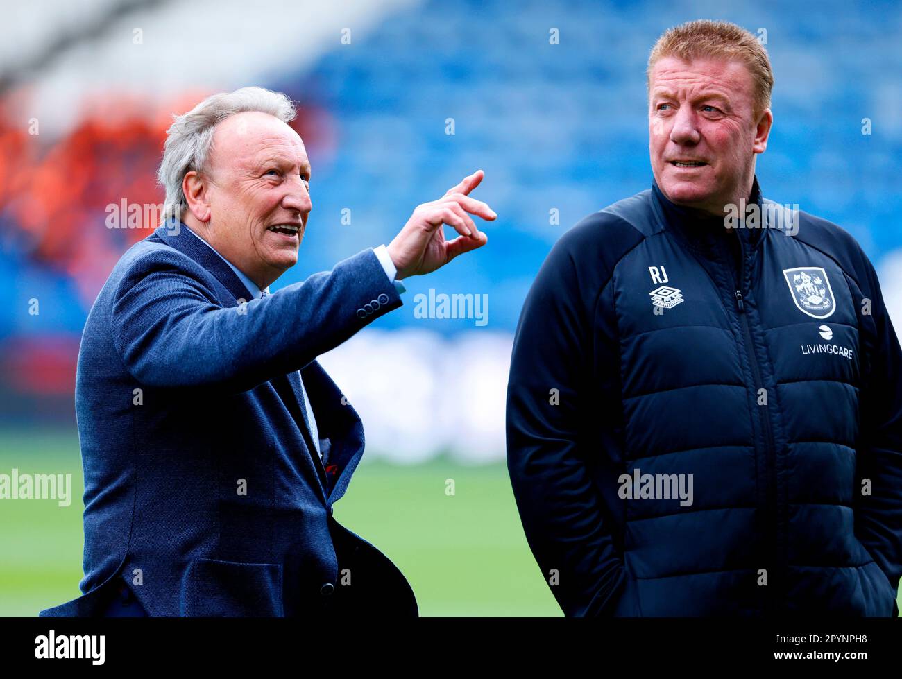 Huddersfield Town manager Neil Warnock (left) and assistant manager ...