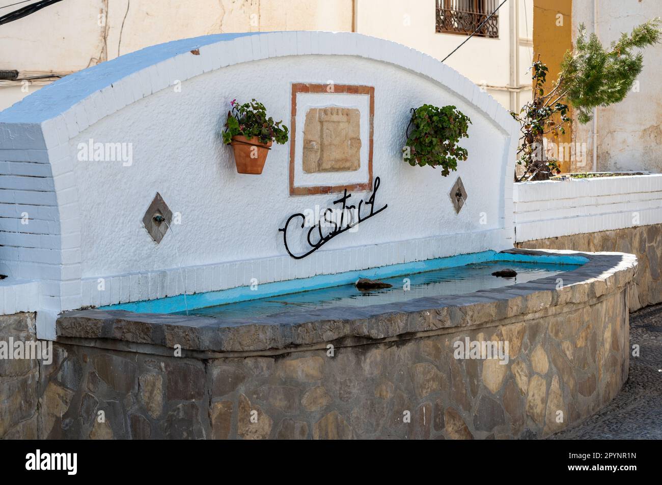 Stone fountain with the name of the Granada town of Castril (Spain ...