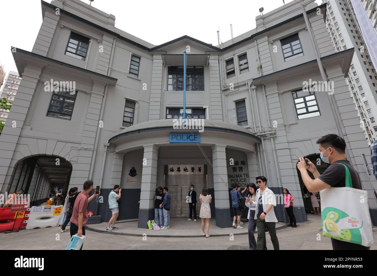 Mainlanders take photos outside the old Yau Ma Tei Police Station in ...