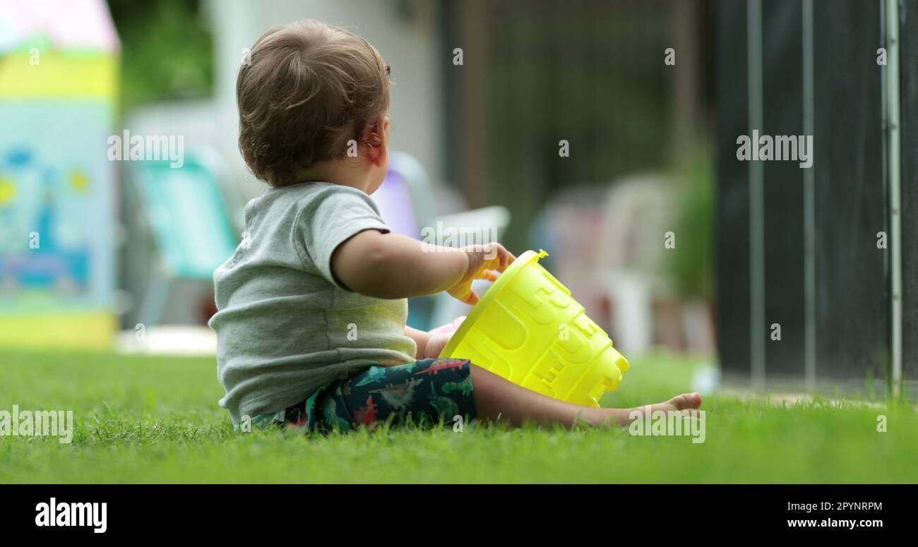 Toddler crawling outside yard hi-res stock photography and images - Alamy