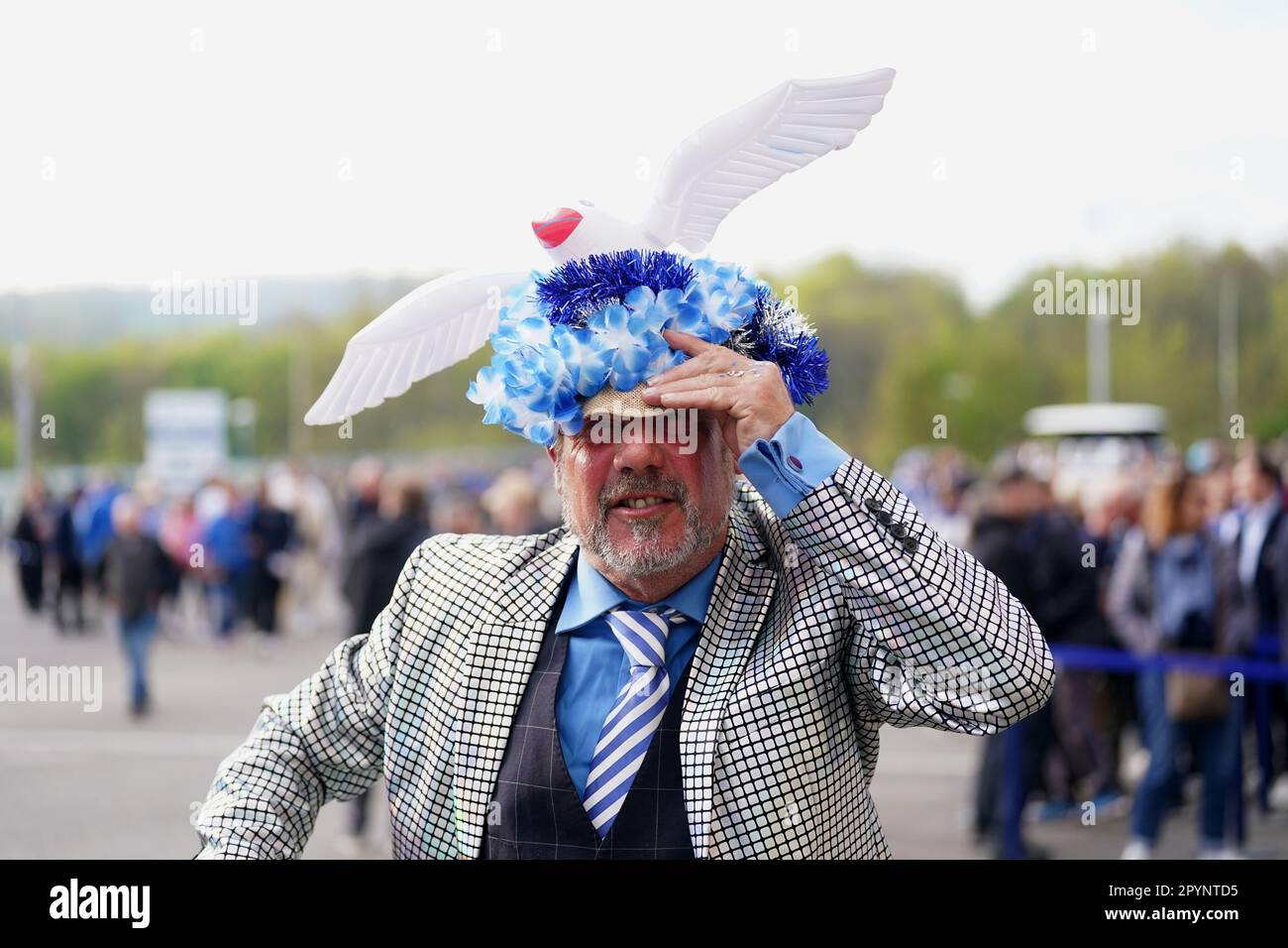A Brighton and Hove Albion fan wearing a seagull hat arriving before ...