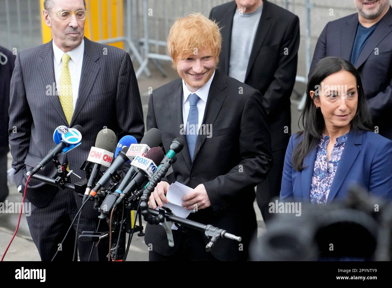 Recording artist Ed Sheeran speaks to the media outside New York ...