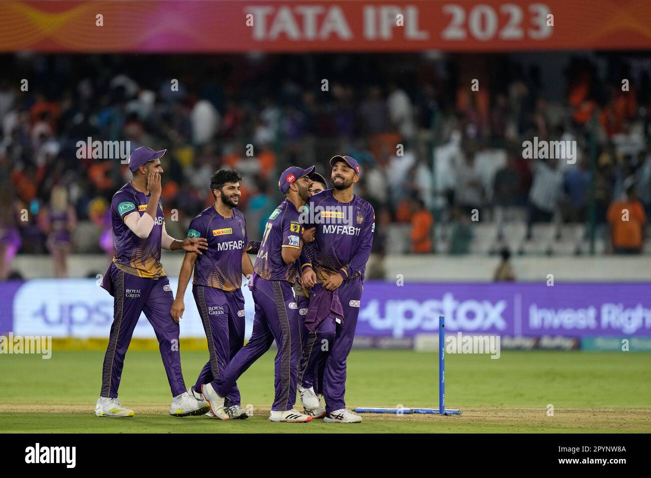 Kolkata Knight Riders' Varun Chakravarthy, right, and teammates ...