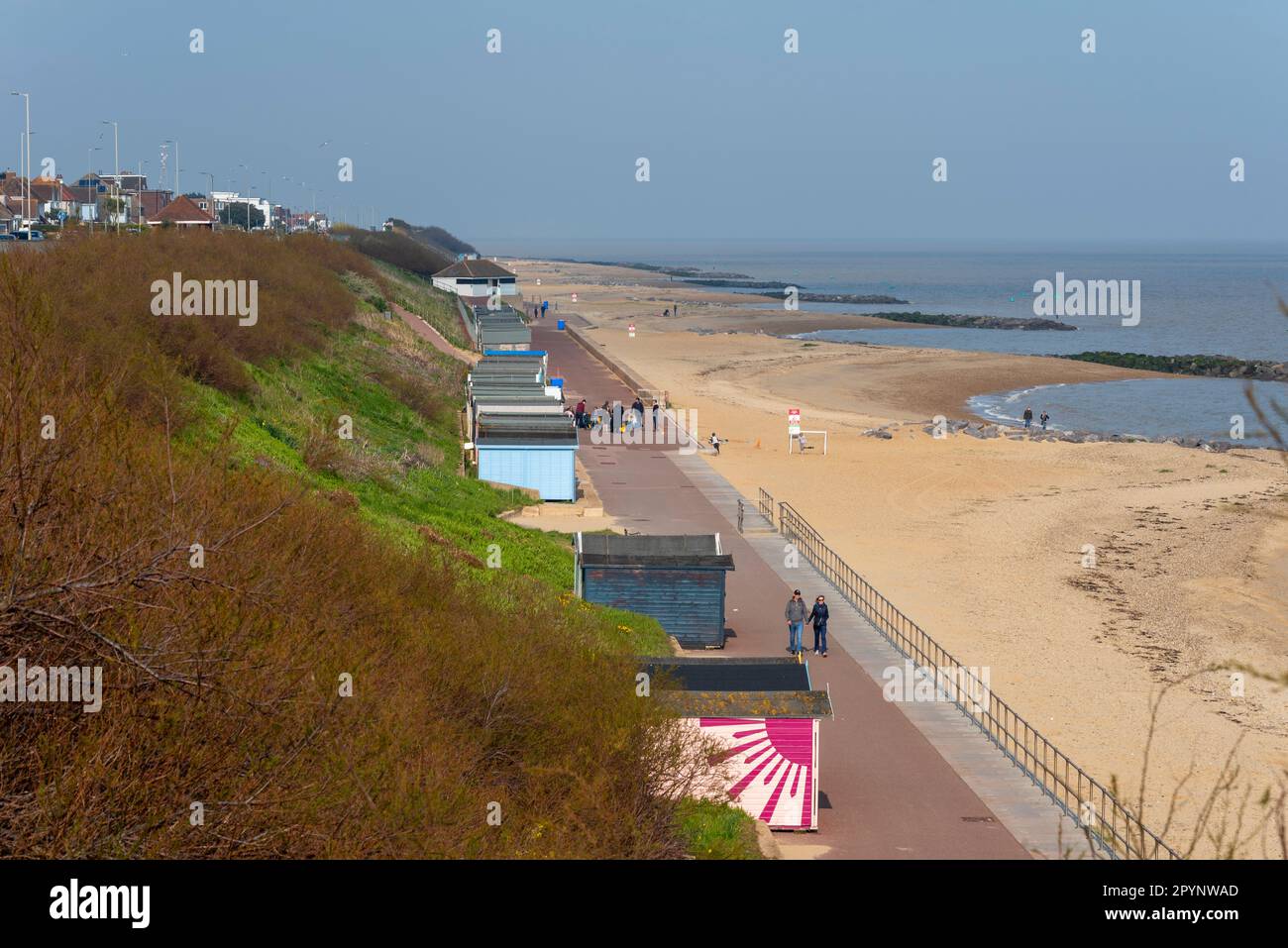 Beach, beach huts, promenade and cliffs on the seafront Clacton on Sea ...
