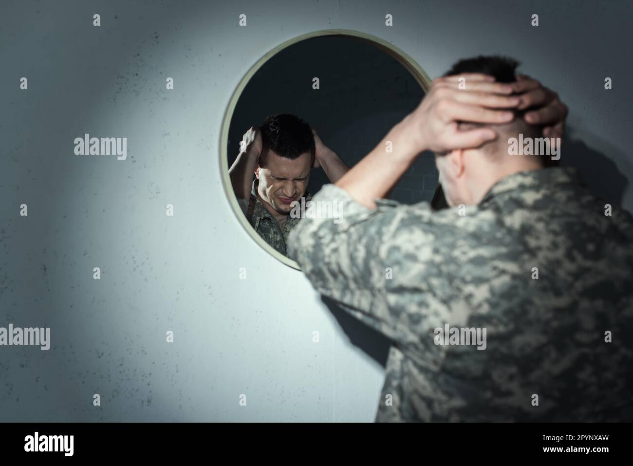 Stressed military veteran suffering from post traumatic stress disorder ...