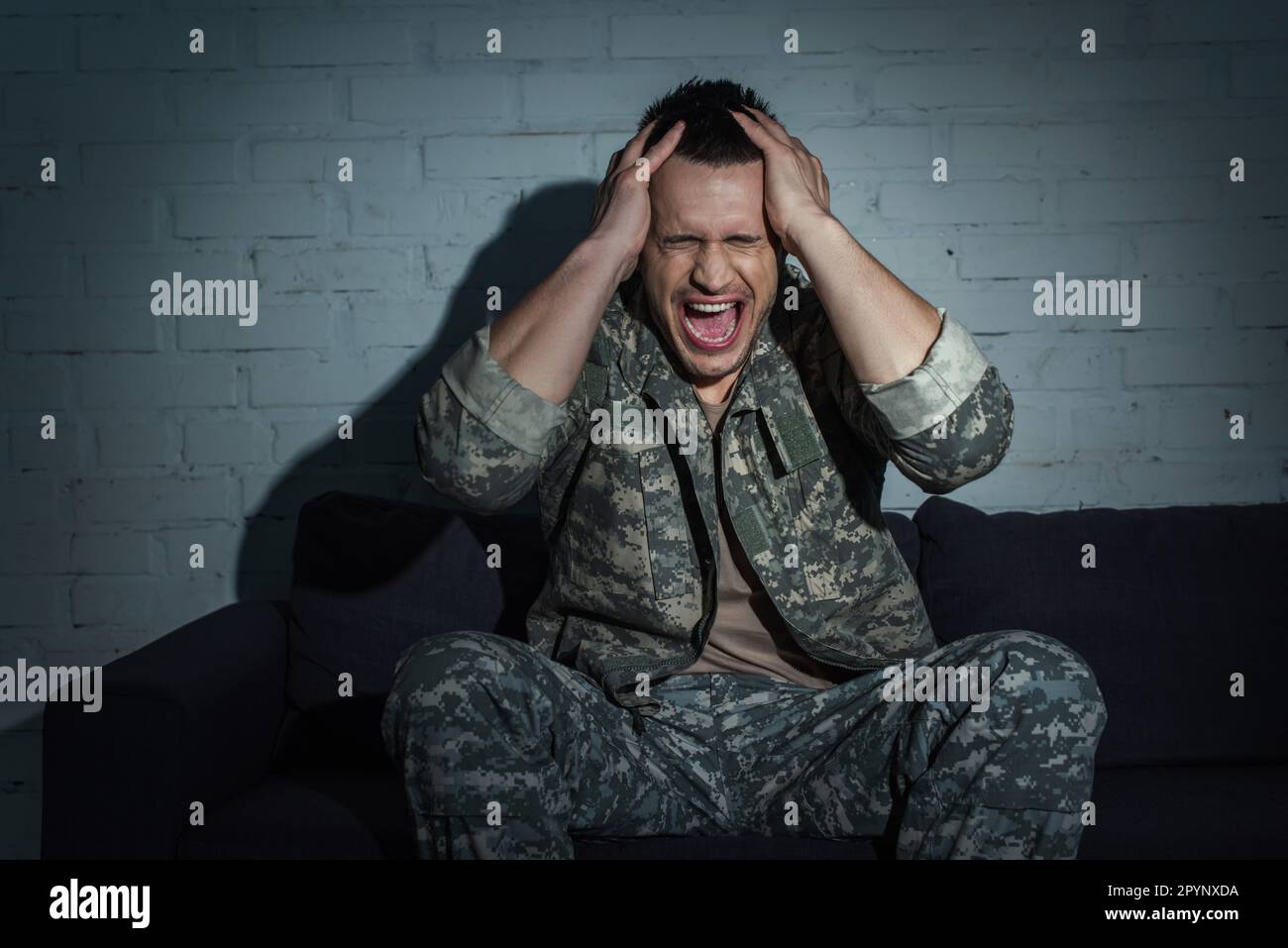 Military veteran with post traumatic stress disorder screaming and ...