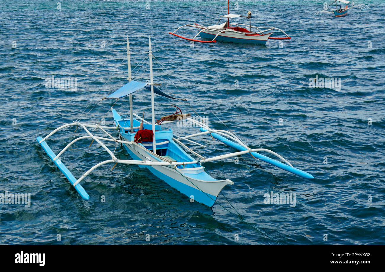 traditional wooden outrigger boats on the philippine islands Stock ...