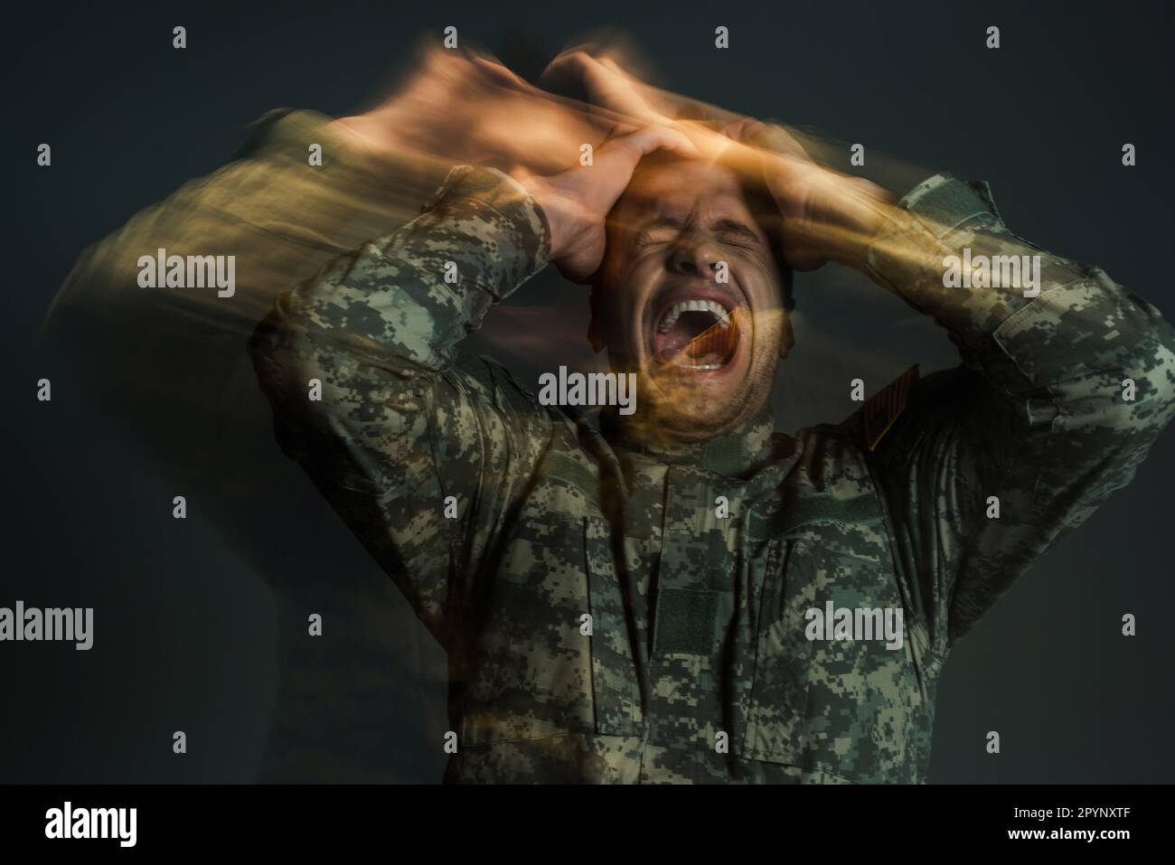 long exposure of soldier in uniform screaming while suffering from ...
