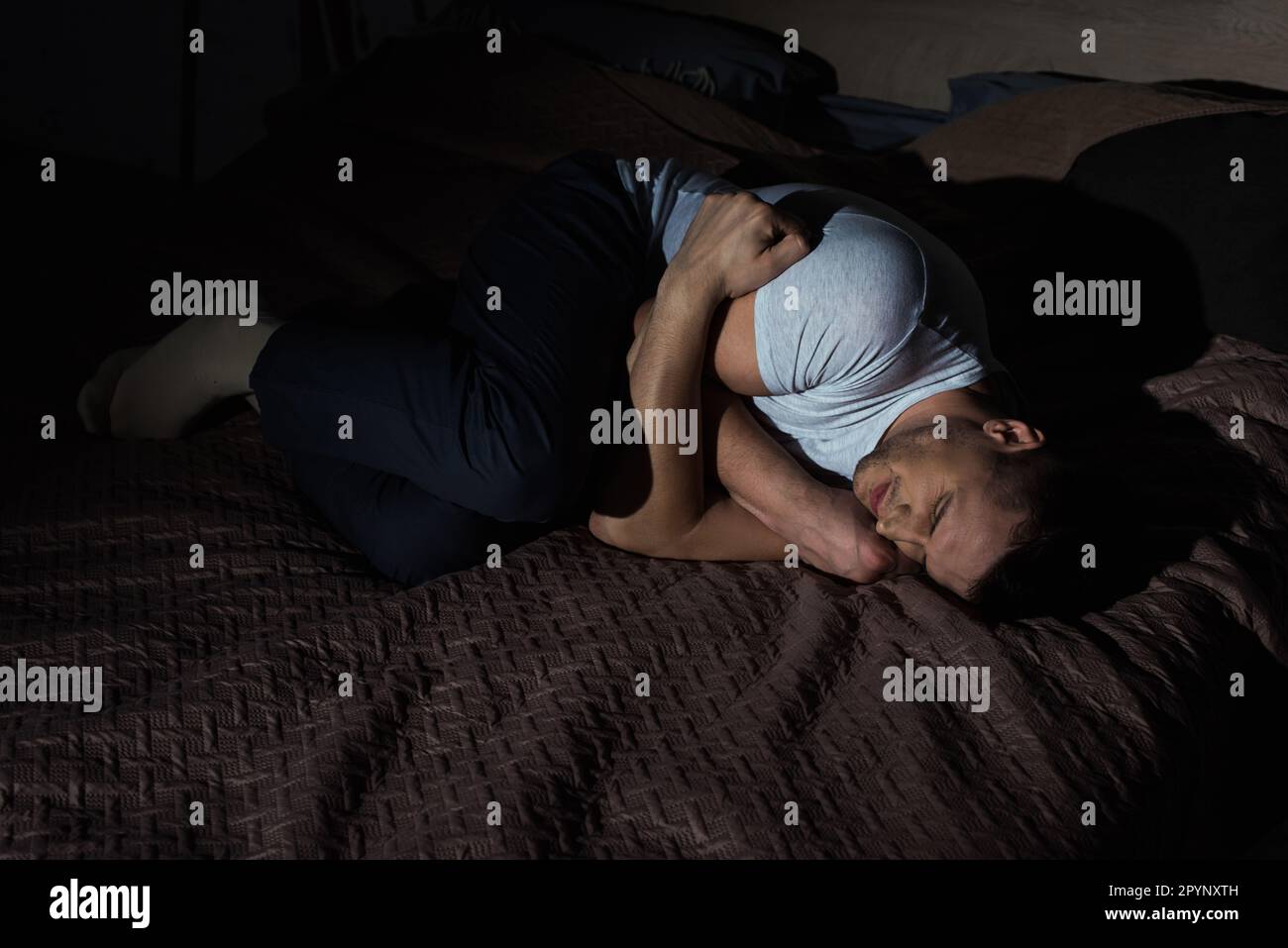 depressed young man with closed eyes suffering from post traumatic ...