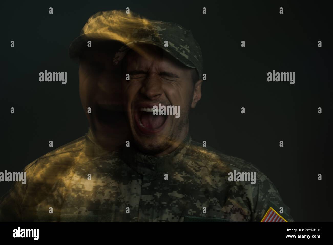 Double exposure of soldier in uniform screaming while suffering from ...