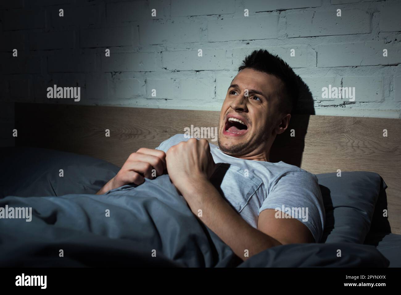 Man having nightmares hi-res stock photography and images - Alamy