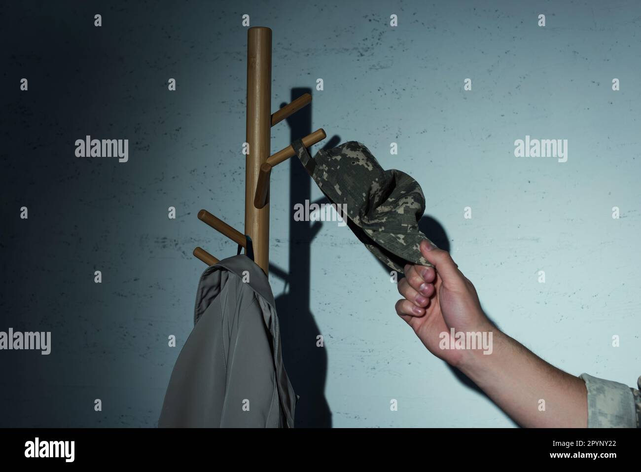 Putting on uniform night hi-res stock photography and images - Alamy