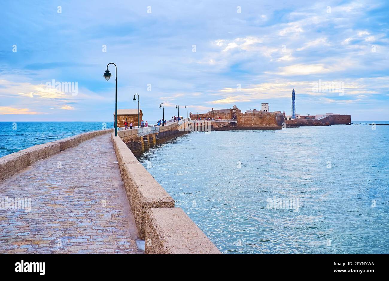 Paseo Fernando Quinones is a stone levee, leading from La Caleta beach ...