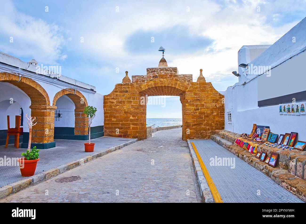 The medieval stone La Caleta gate of San Sebastian Castle on the ...