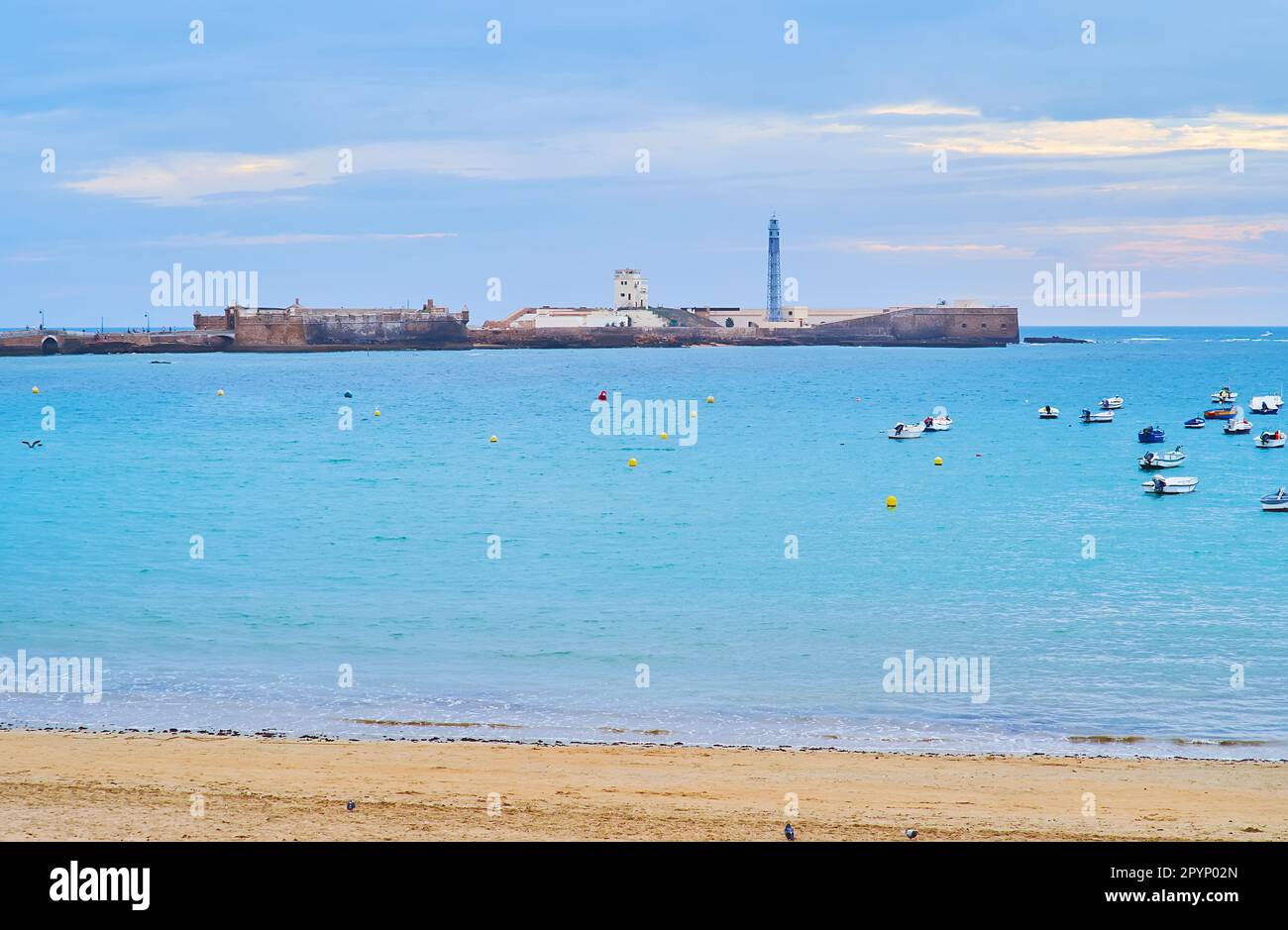 The medieval stone San Sebastian Castle from La Caleta beach, Cadiz, Costa de la Luz, Spain ...