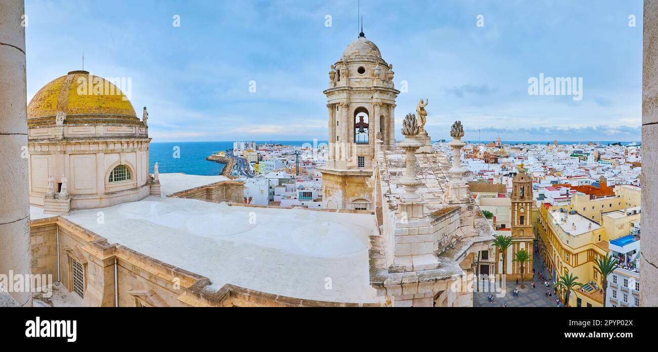 Panorama of Cadiz Cathedral roof with sculptured bell tower, huge dome ...