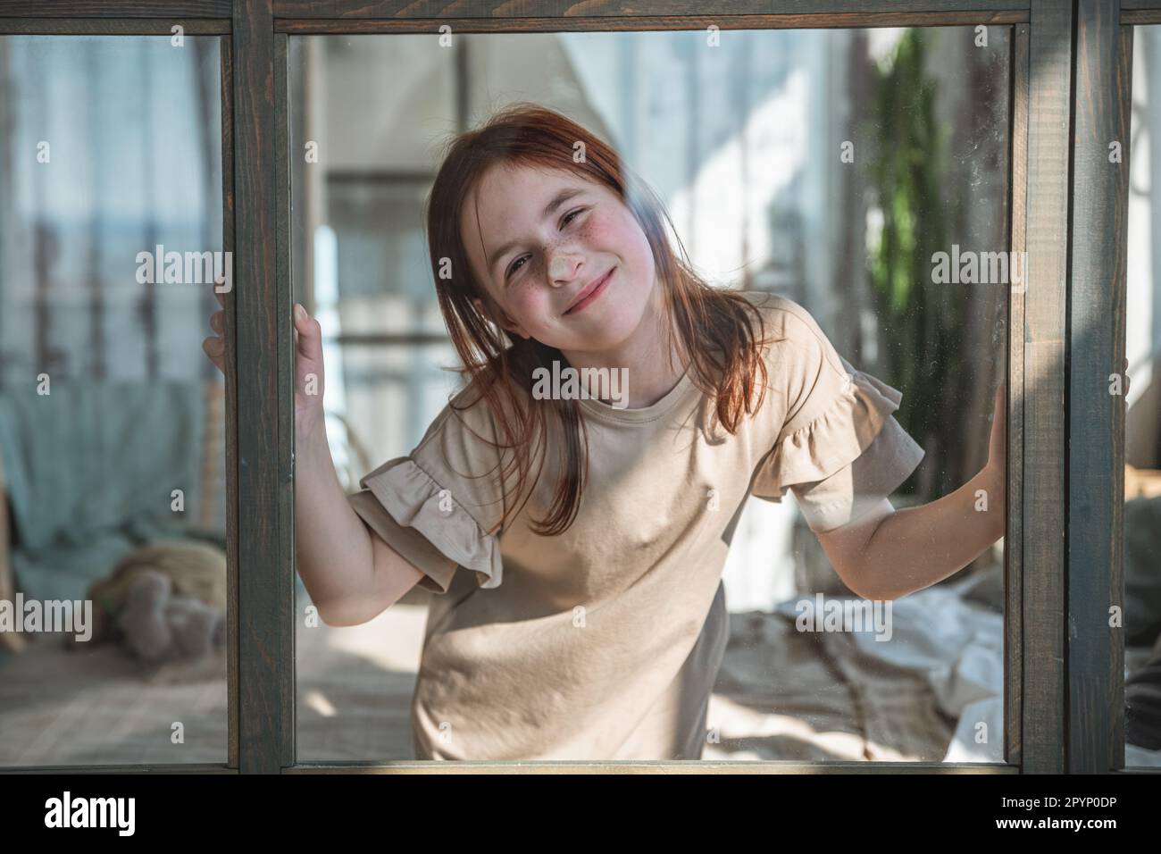 Face pressed against glass window hi-res stock photography and images ...
