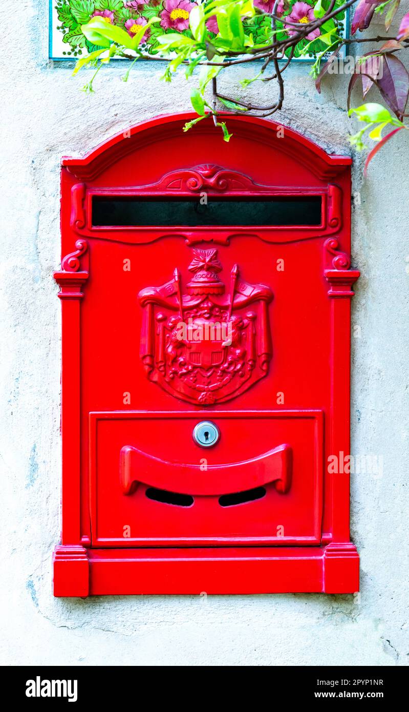Vintage red mailbox with secret lock Stock Photo - Alamy