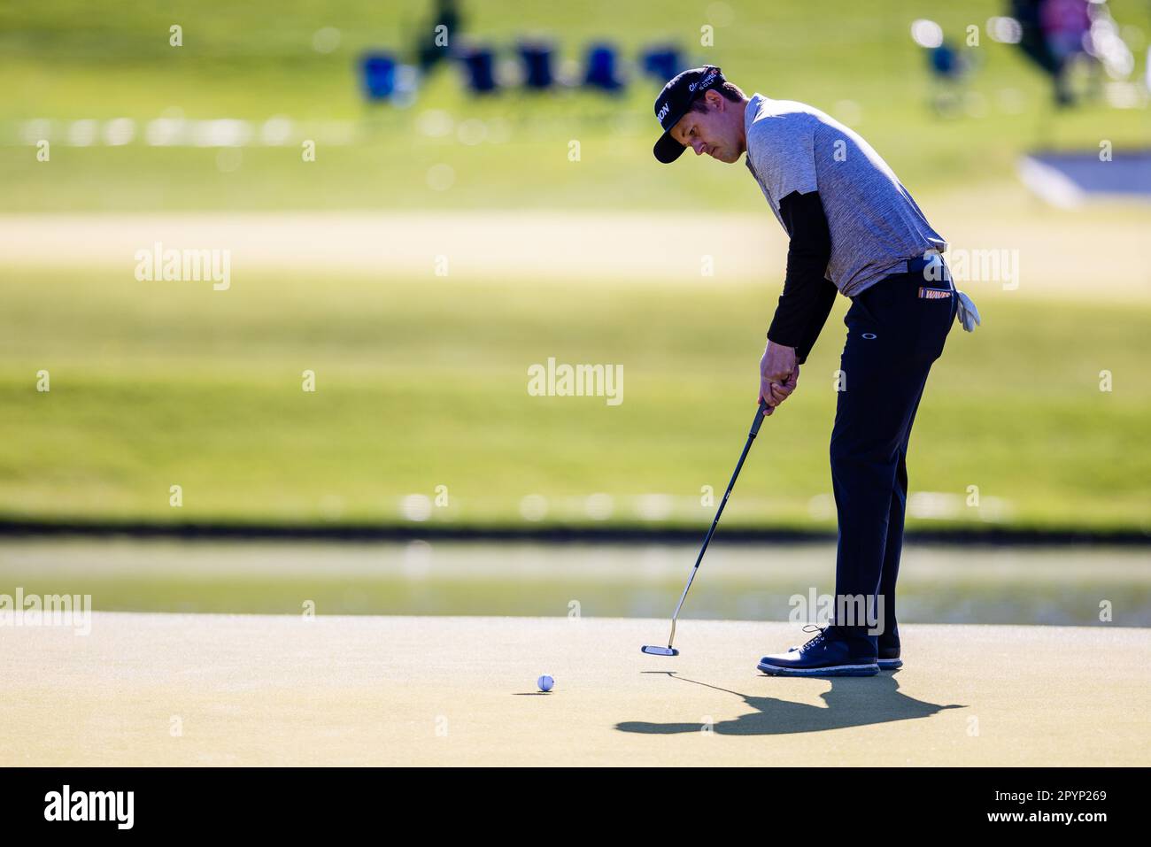 Charlotte, NC, USA. 4th May, 2023. Andrew Putnam putts for par on the 16th during the First ...